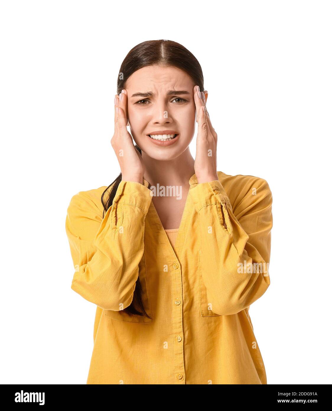 Stressed young woman on white background Stock Photo - Alamy