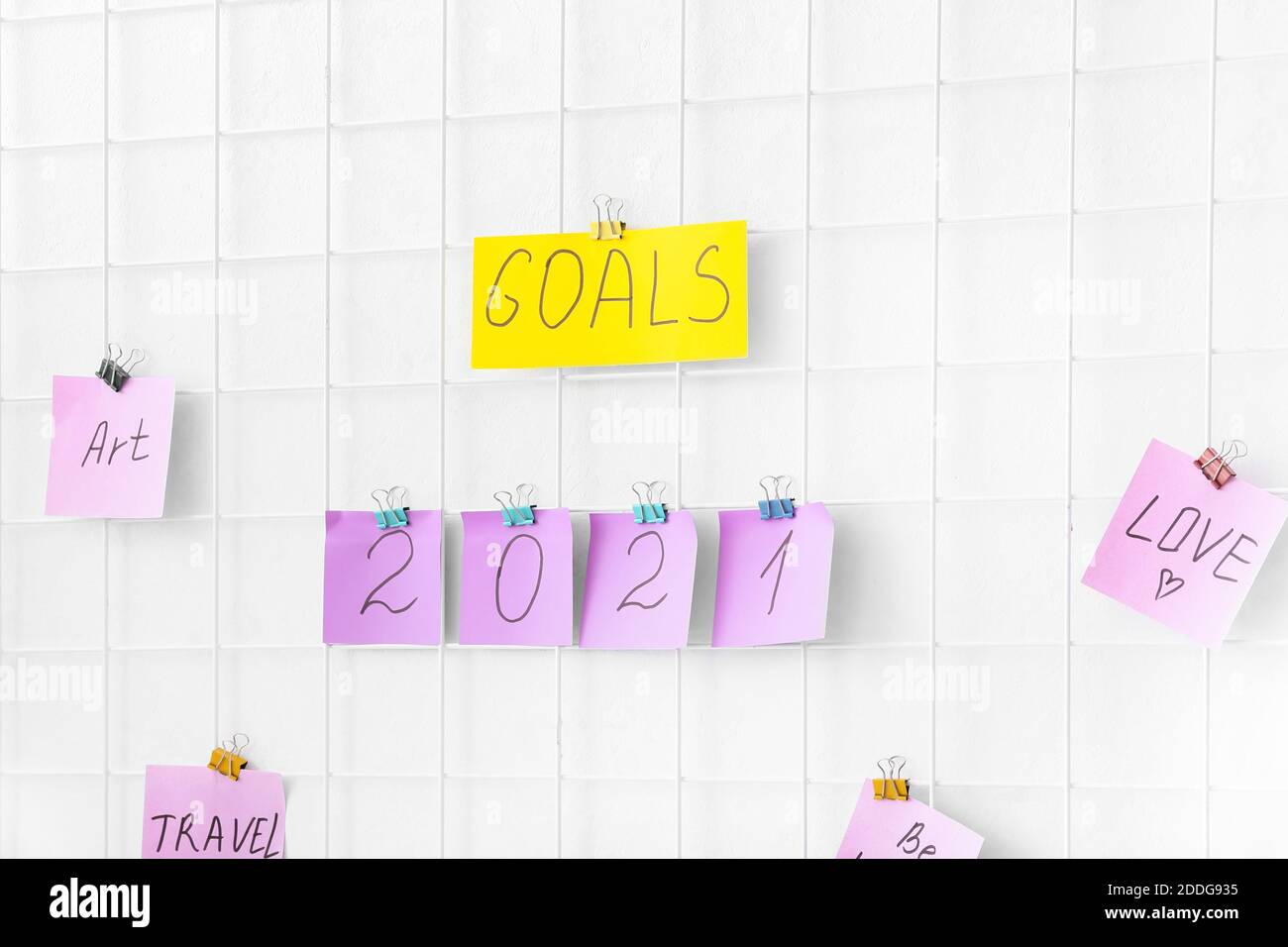 Moodboard with figure 2021 and different goals on wall in room Stock ...