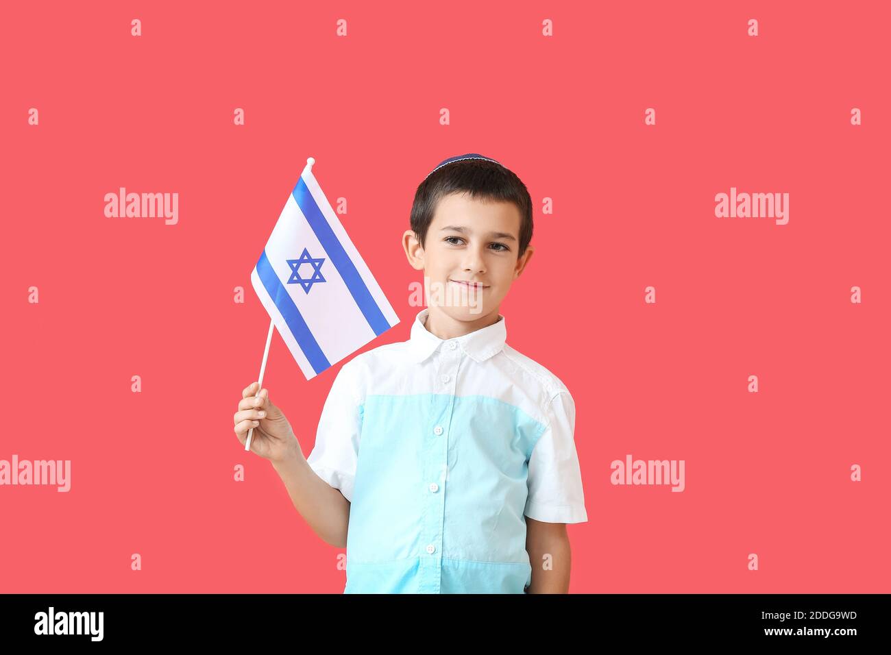 Little boy with the flag of Israel on color background Stock Photo - Alamy