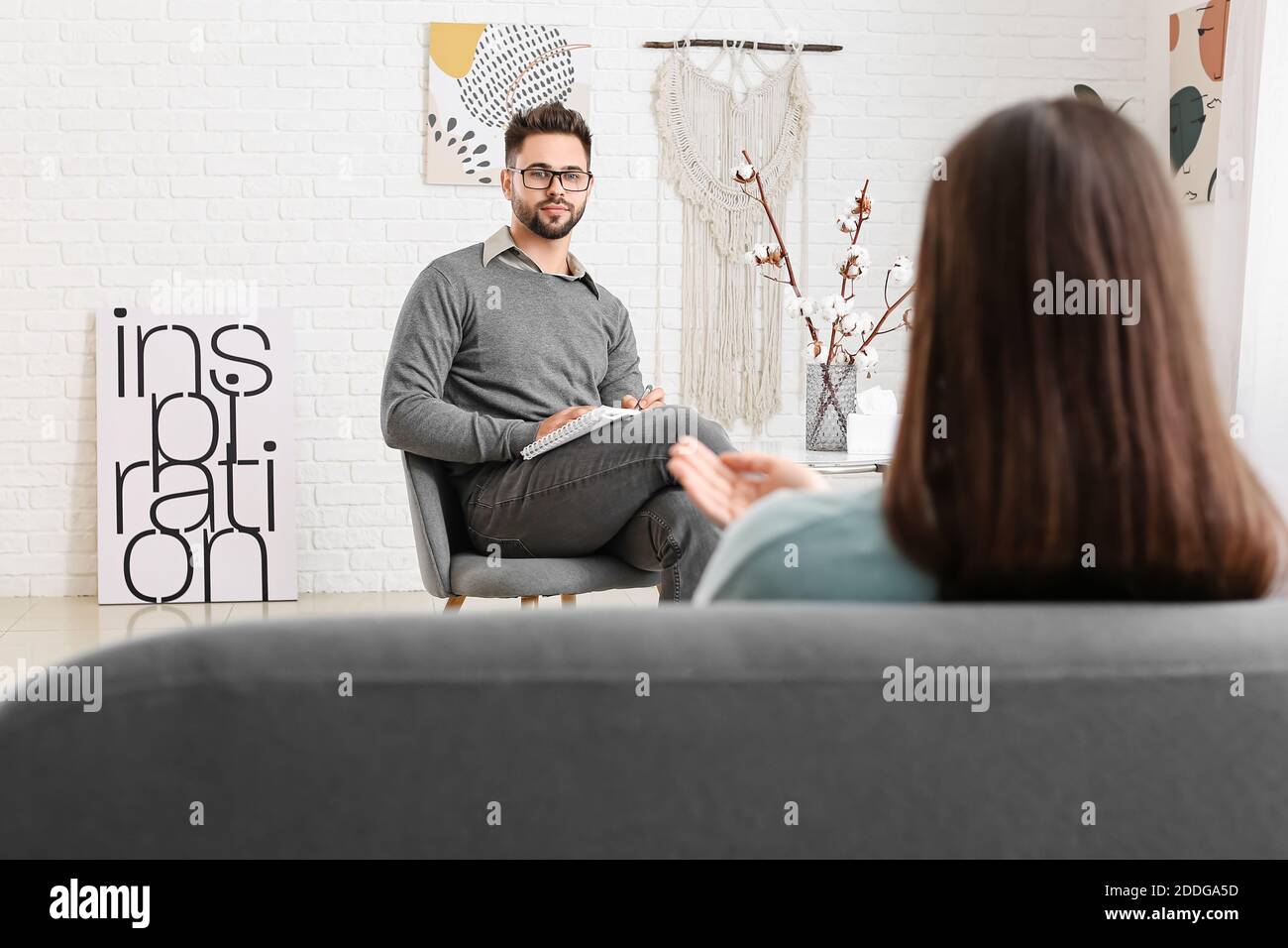 Male psychologist working with patient in office Stock Photo - Alamy