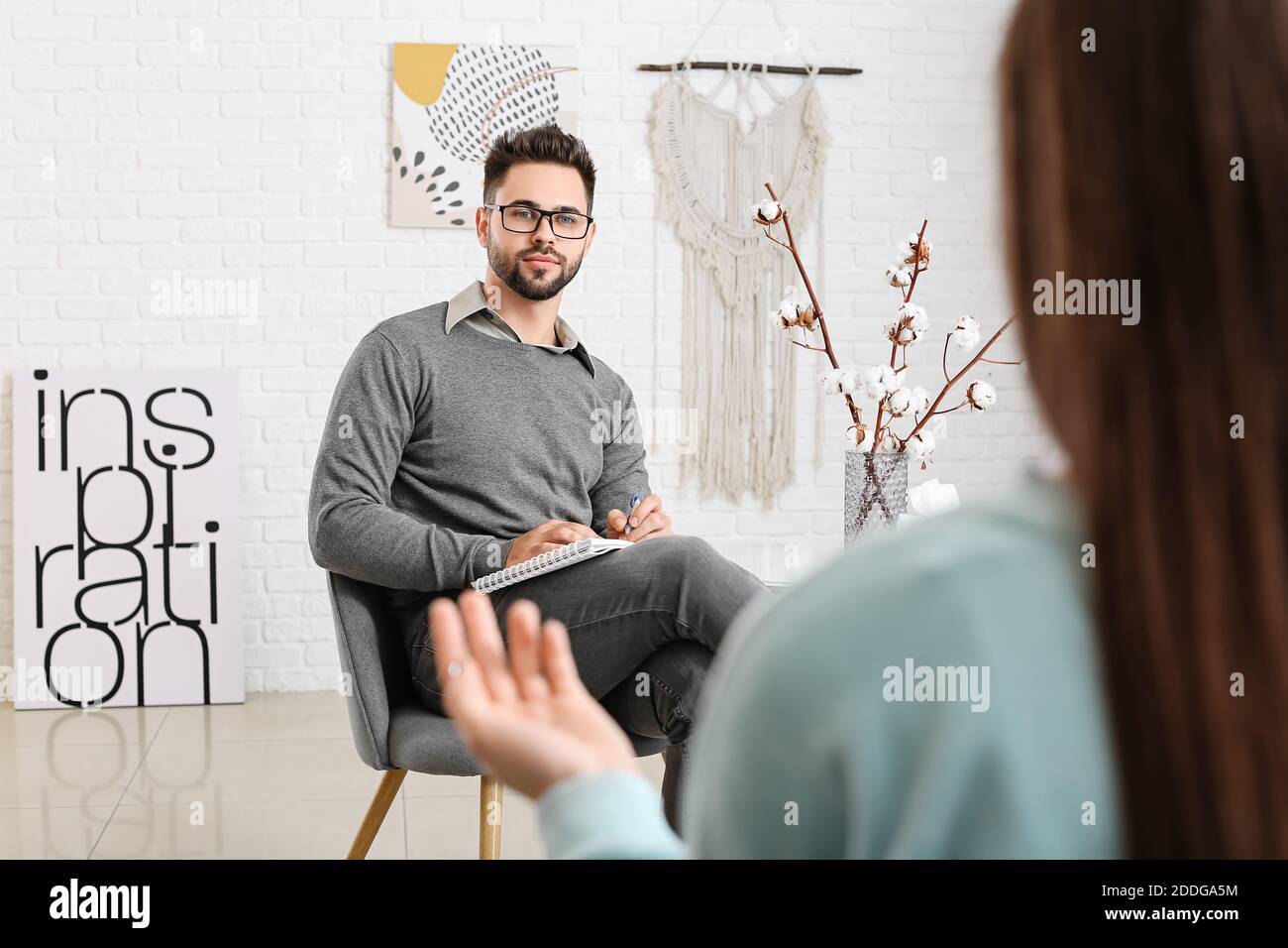 Male psychologist working with patient in office Stock Photo - Alamy