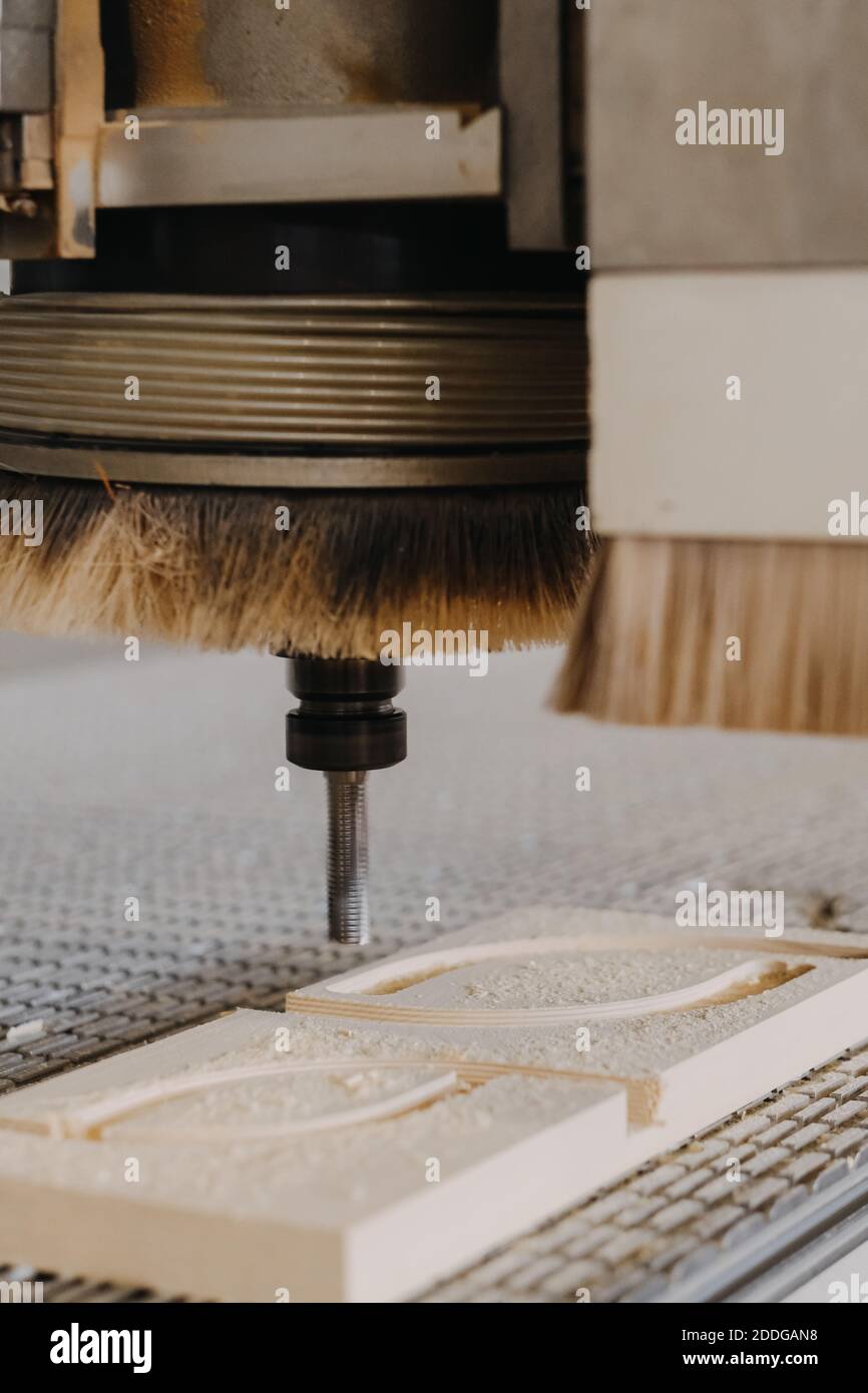 A vertical shot of wood milling machine Stock Photo - Alamy
