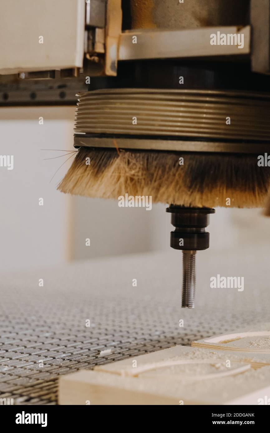 A vertical shot of wood milling machine Stock Photo - Alamy