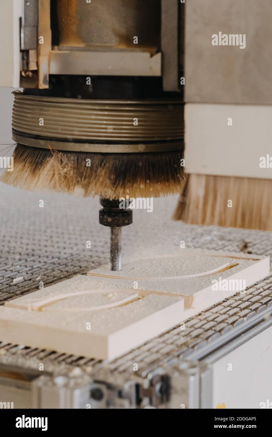 A vertical shot of wood milling machine Stock Photo - Alamy