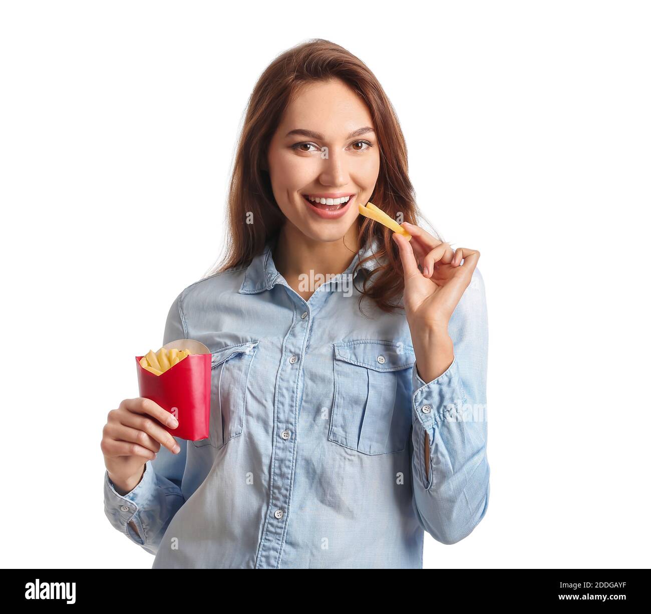 Young woman with french fries on white background Stock Photo - Alamy