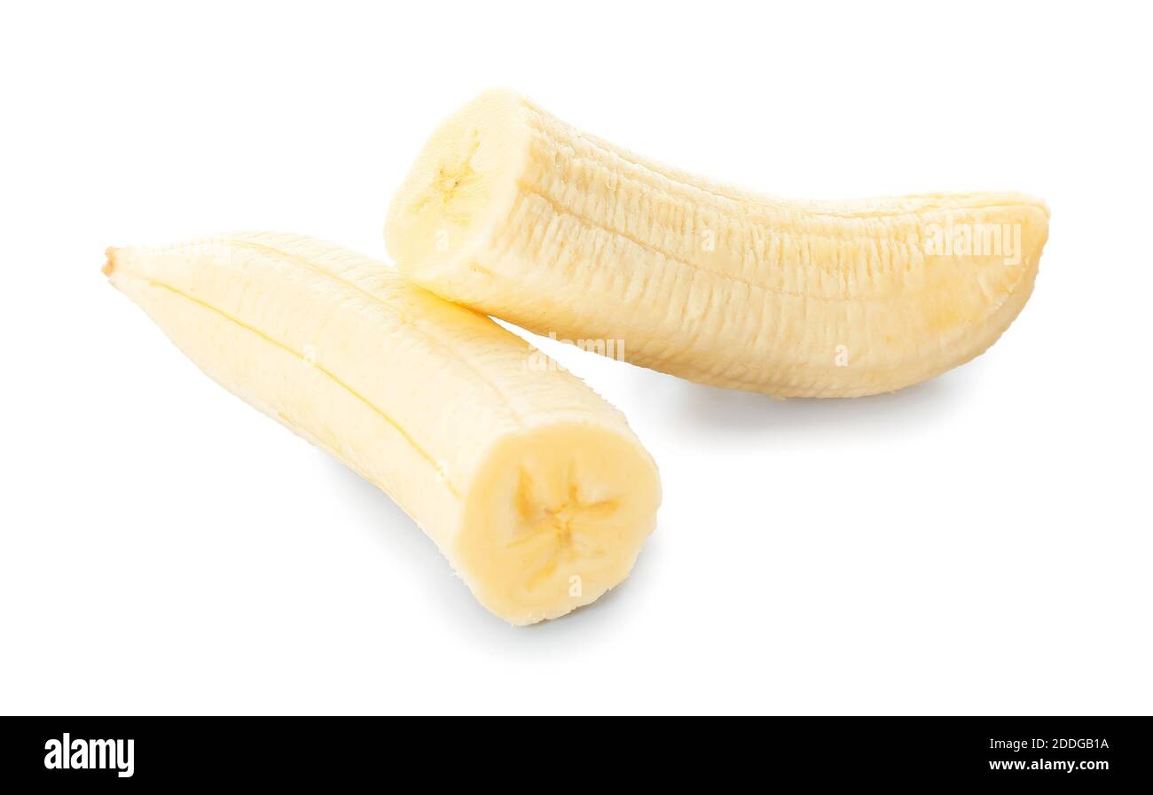 Peeled cut banana on light background Stock Photo - Alamy
