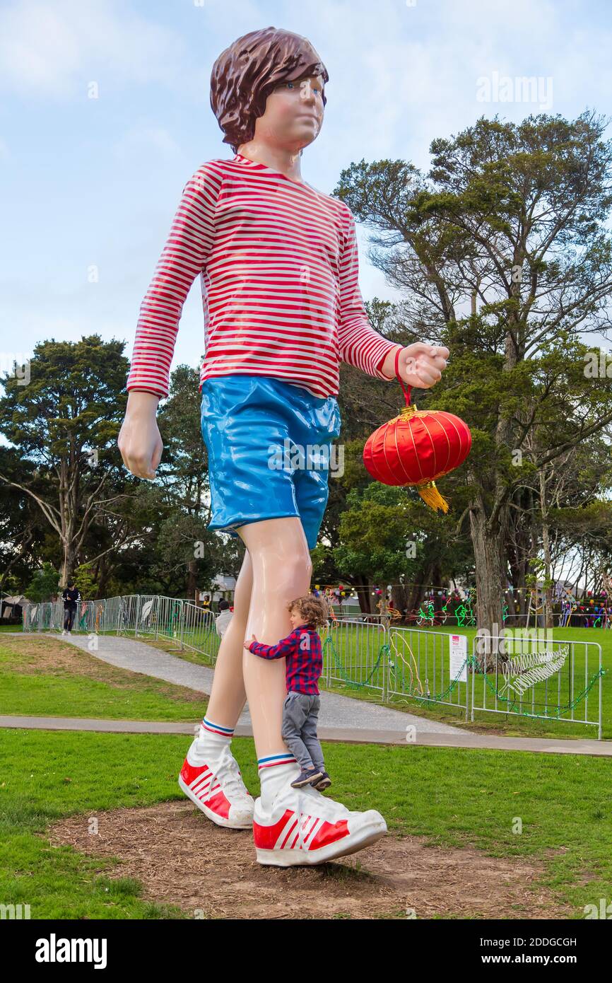 A giant, realistic statue called "Boy Walking" in Auckland, New Zealand ...