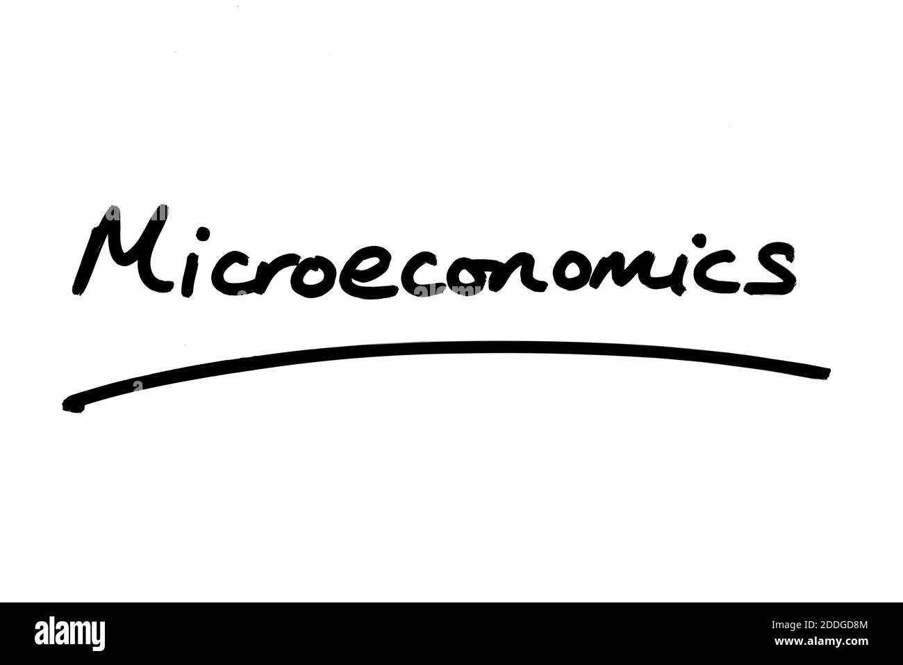 Microeconomics handwritten on a white background Stock Photo - Alamy