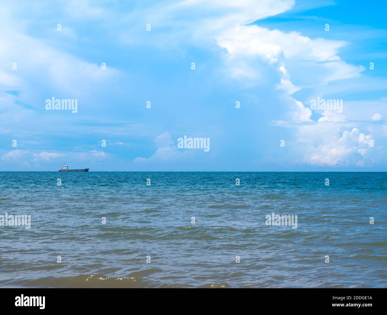 Far away from the coast the big ship still floating alone in the silent ...