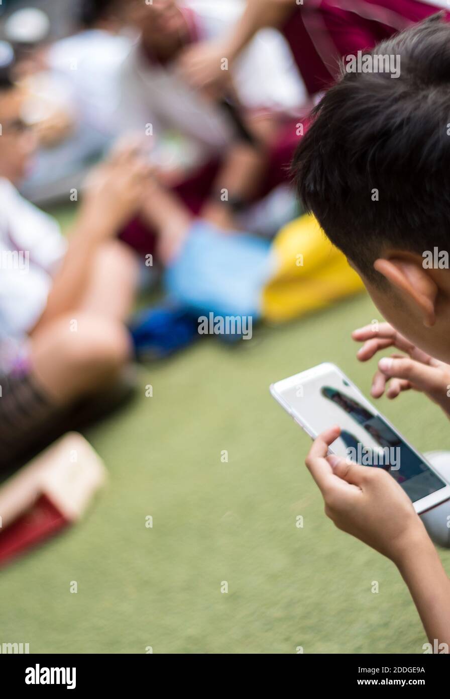 BANGKOK THAILAND - April 19, 2018, Many Serious children playing on a ...
