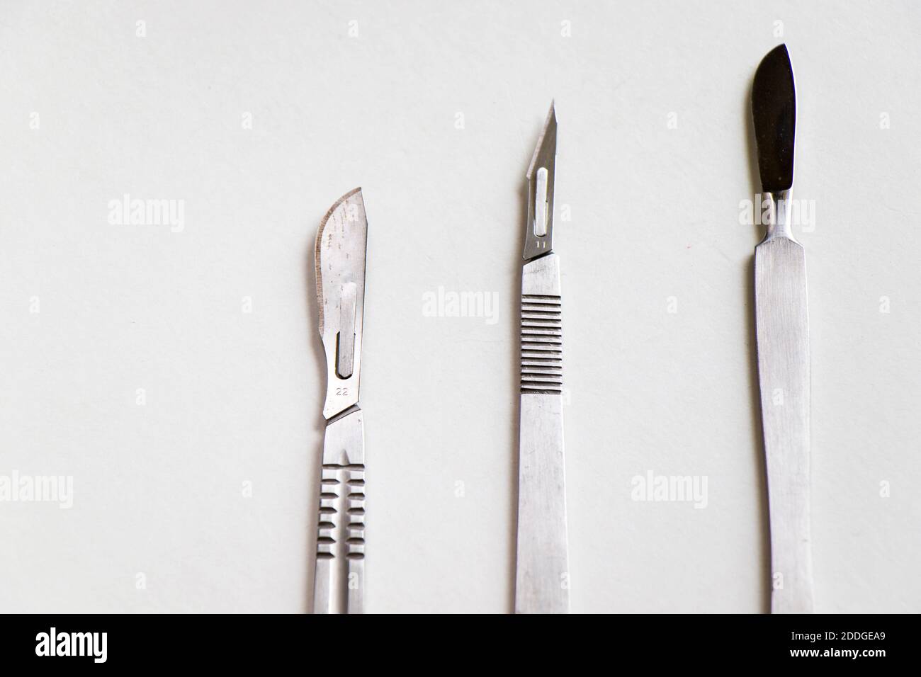 Surgery blade on the sterile table, scalpel close-up, operation ...