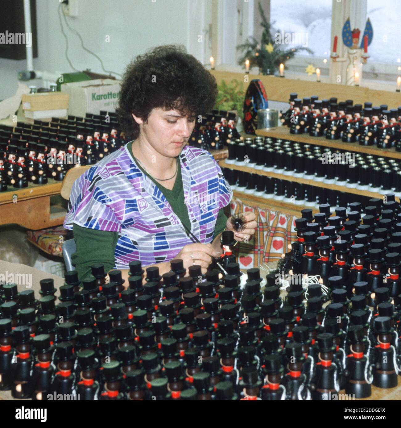 Production of chimney sweep smoking men in Seiffen, Erzgebirge, Saxony ...