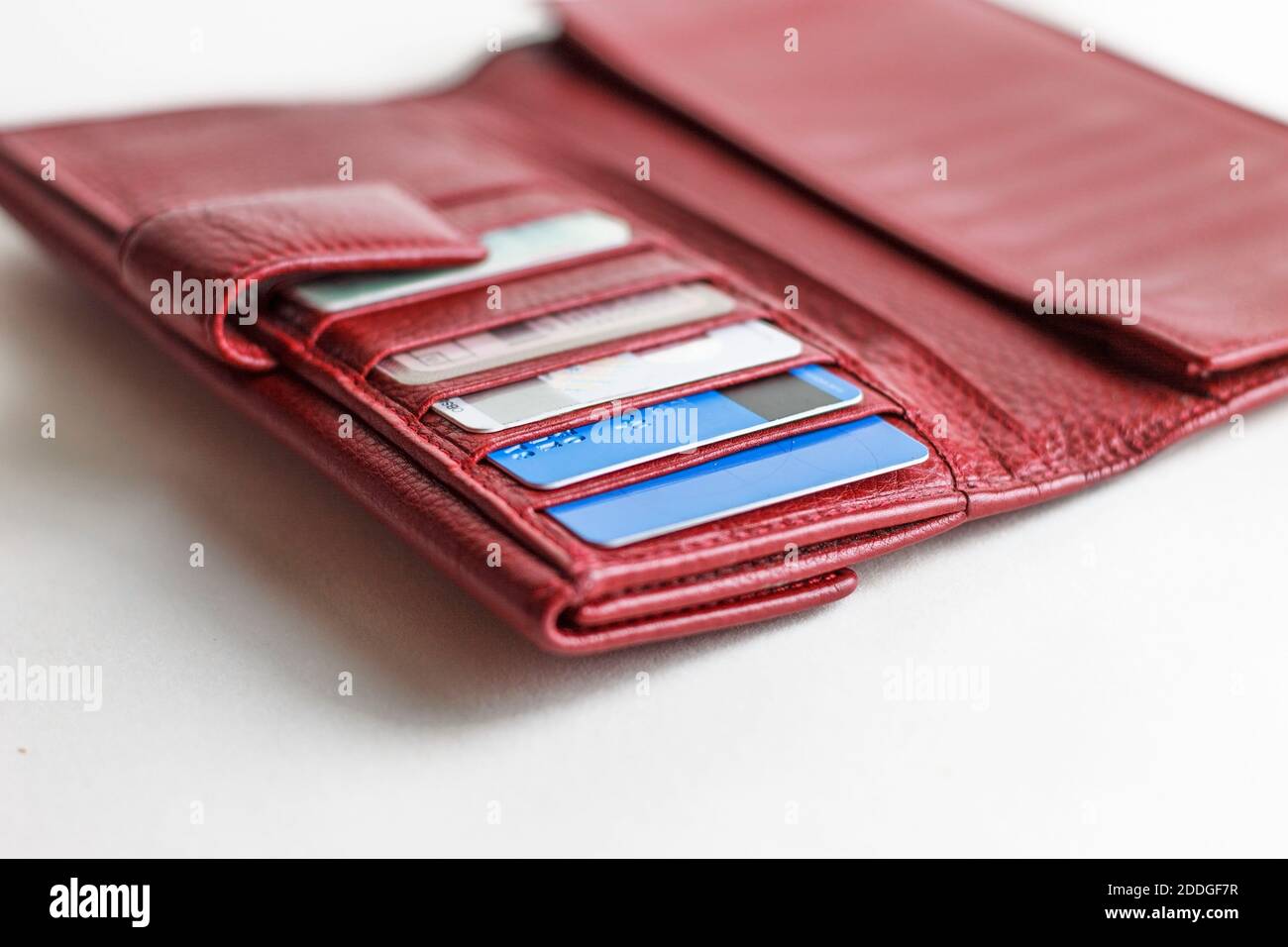 Credit and debit cards in a wallet Stock Photo - Alamy