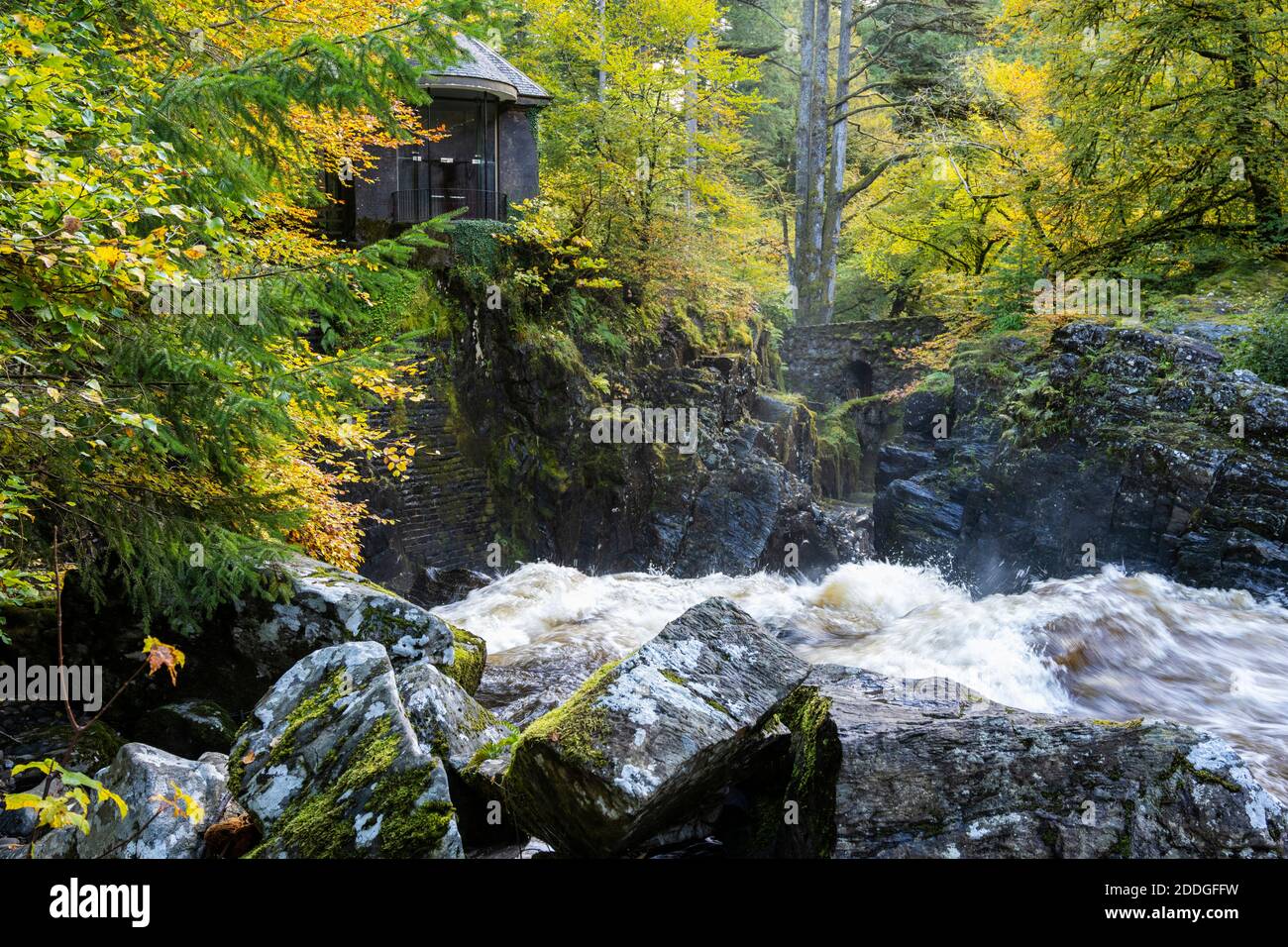 Ossian’s Hall overlooking cascade of Black Linn Waterfall on the River ...