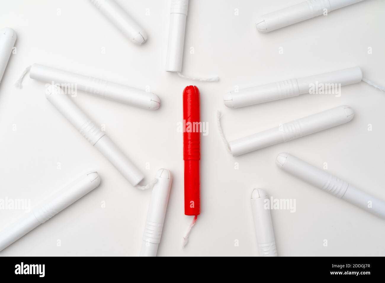 Red and white woman medical tampons on white background Stock Photo - Alamy