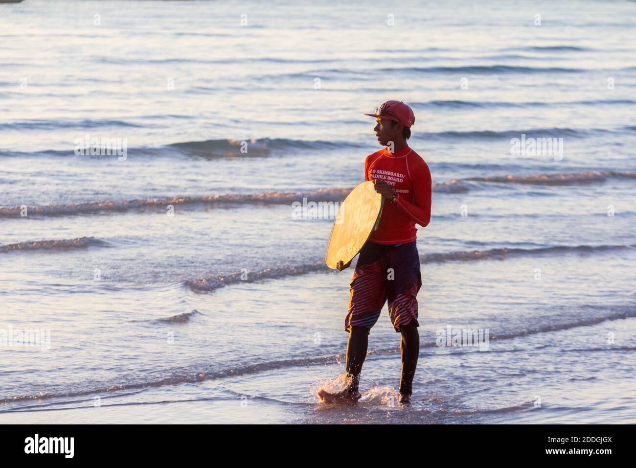 A skimboarder at the beach in Boracay Island, Philippines Stock Photo ...