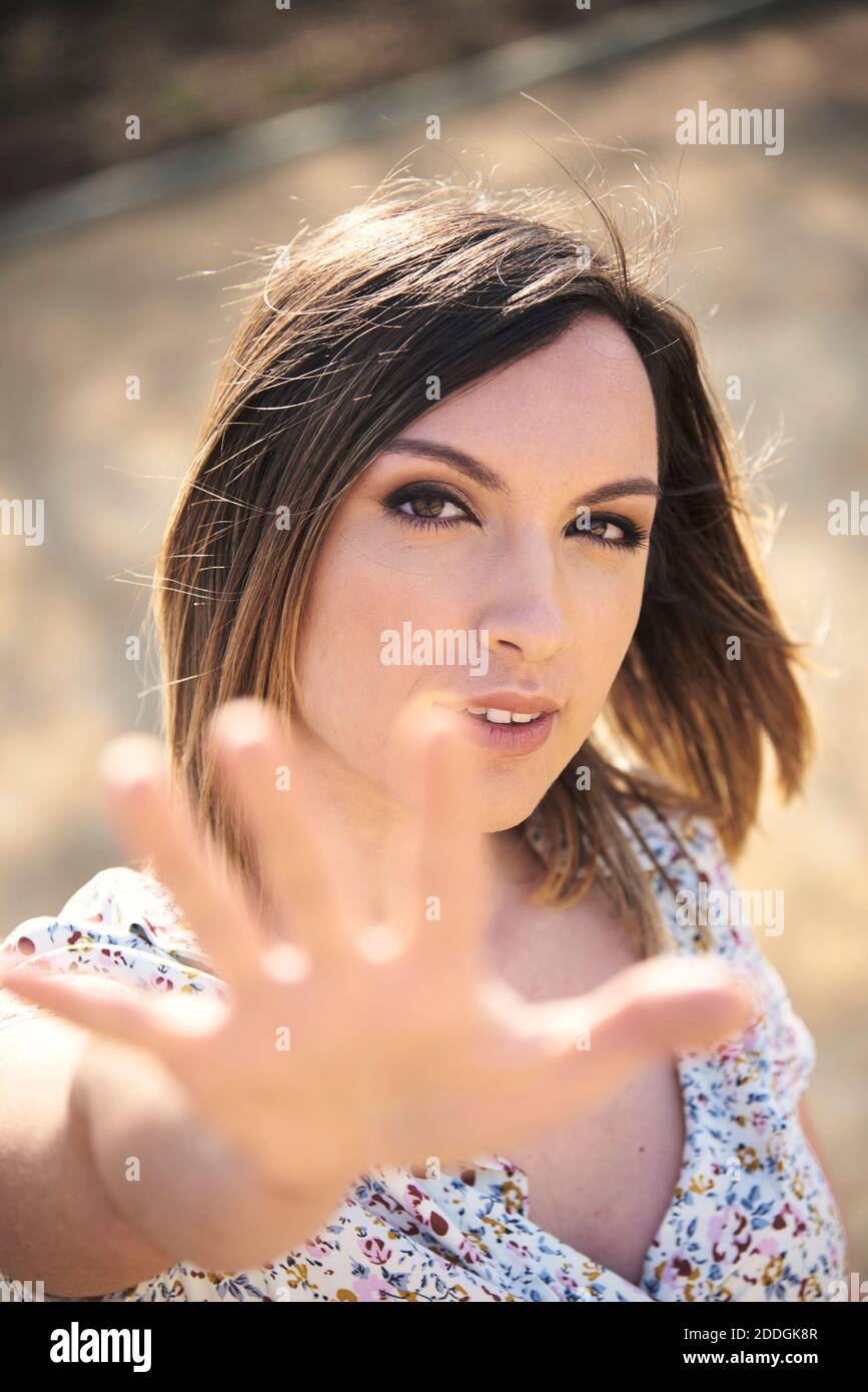Arms hiding hi-res stock photography and images - Alamy