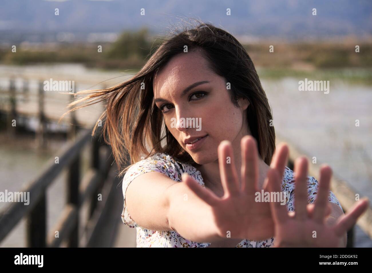 Arms hiding hi-res stock photography and images - Alamy