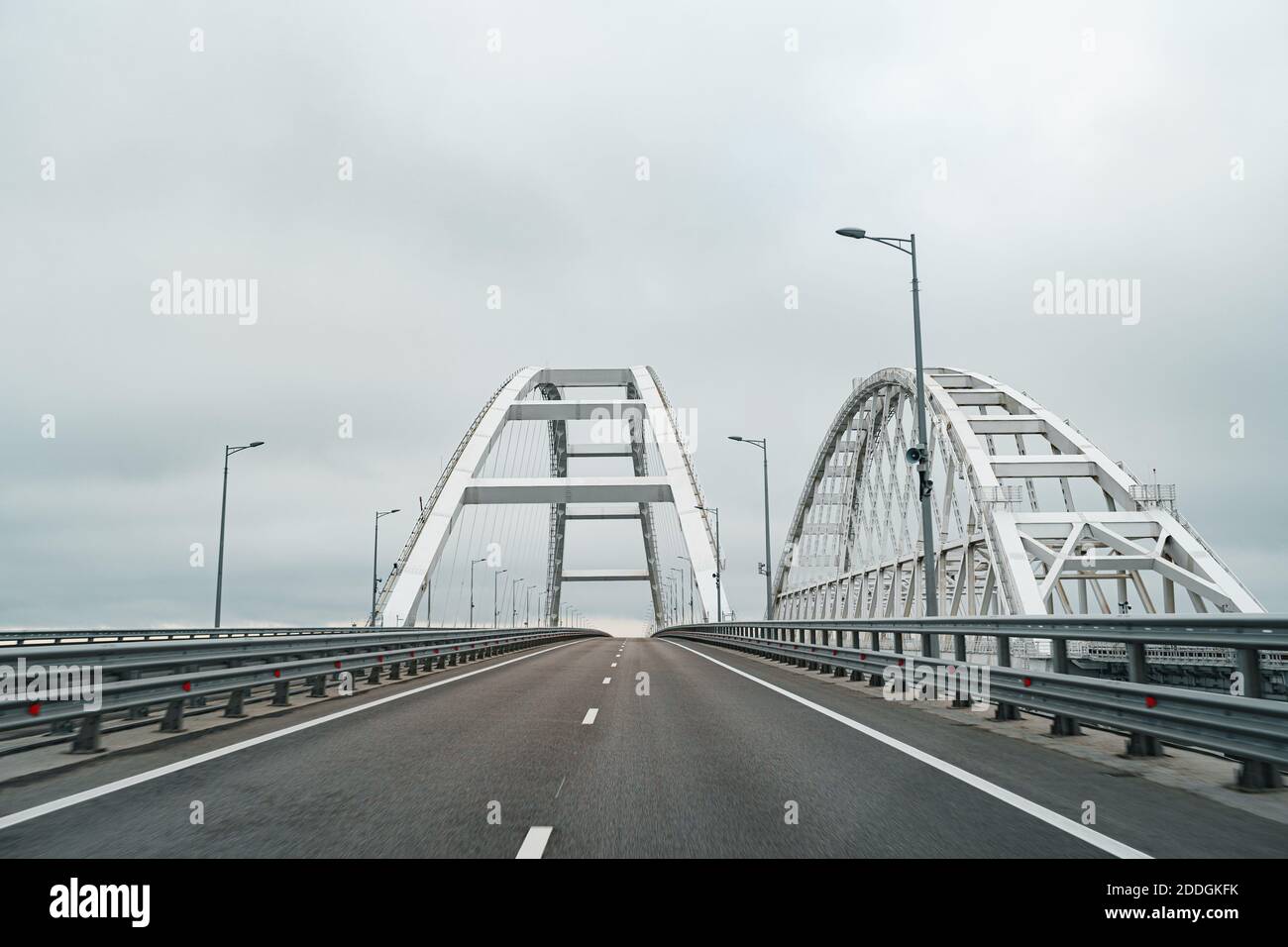 Empty highway with asphalt road and cloudy sky Stock Photo - Alamy