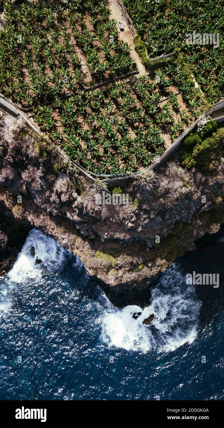From above drone view of powerful foamy sea waves splashing against ...