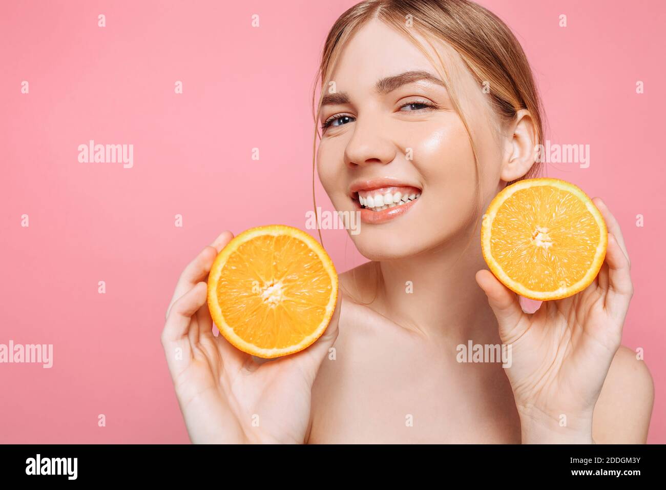 Portrait of a cheerful feminine girl, natural clear skin, girl with two ...