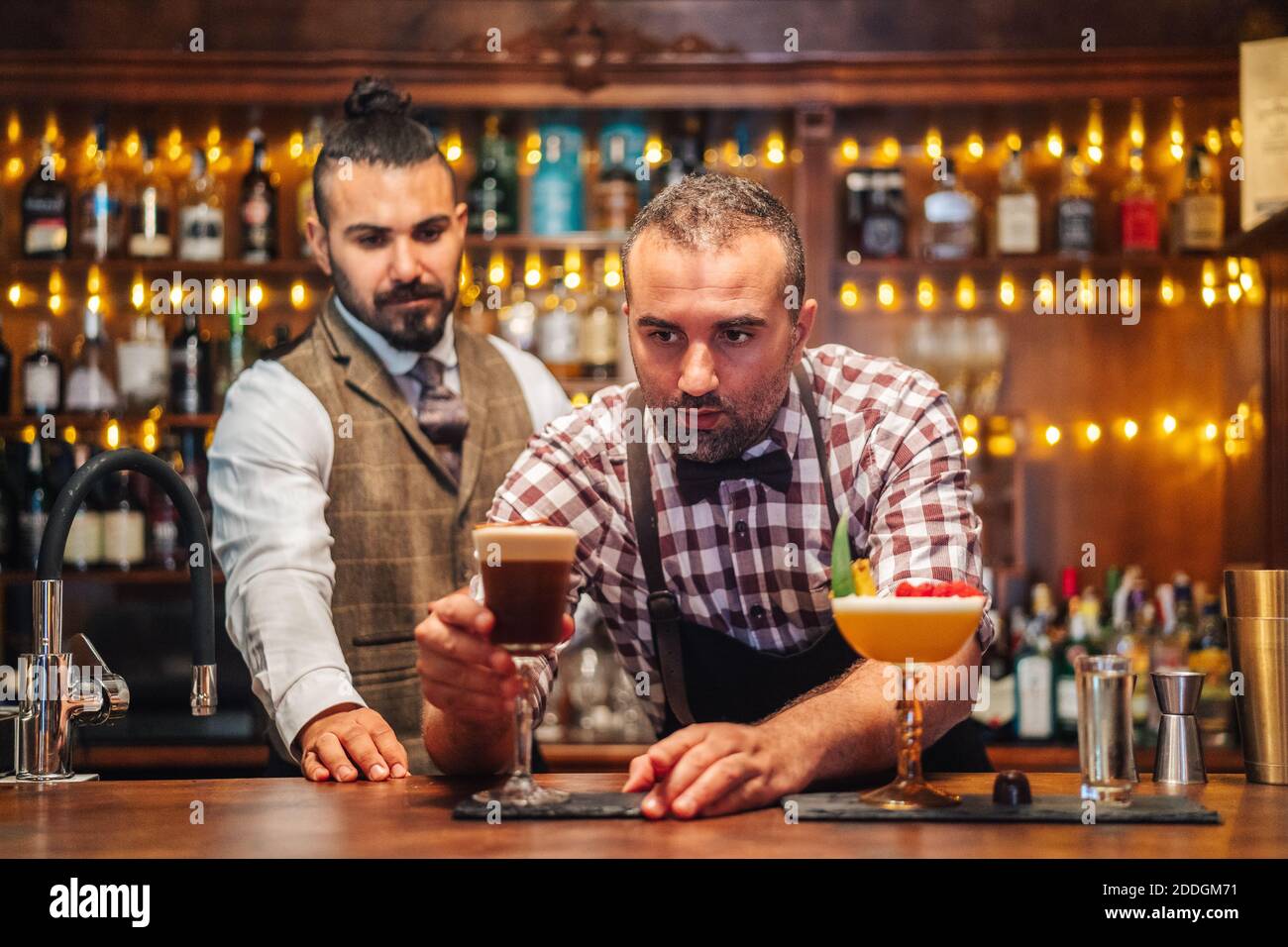Bar counter bartenders hi-res stock photography and images - Alamy