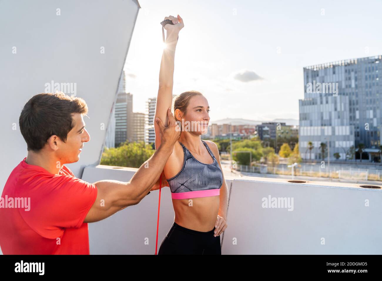 Professional male instructor giving advice and explaining technique of ...