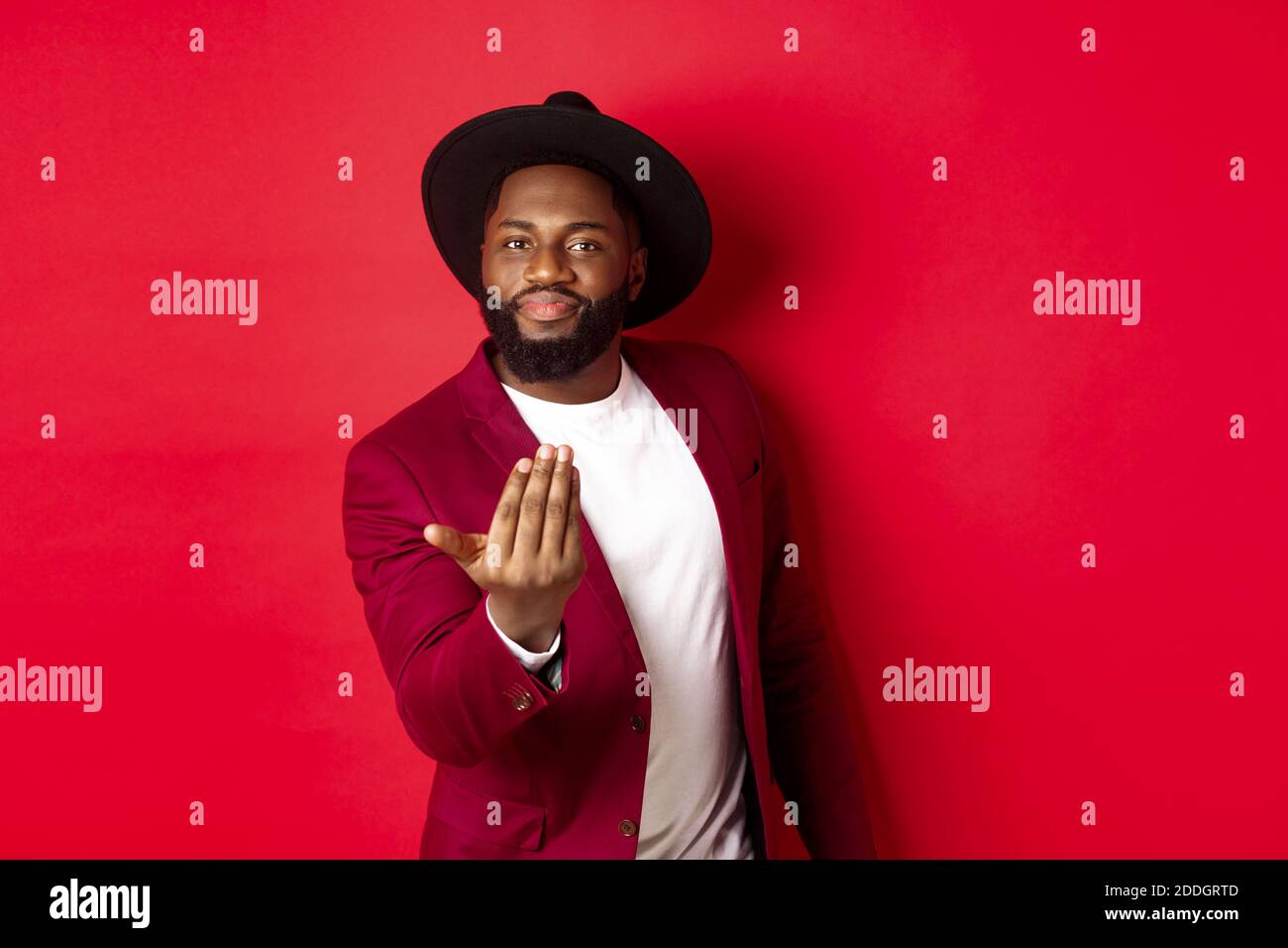 Handsome and masculine Black man asking come closer, luring to step ...