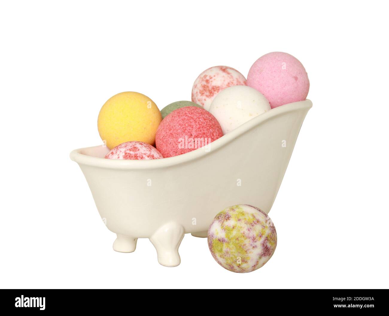Colorful bath bombs in a decorative tub isolated on a white background ...