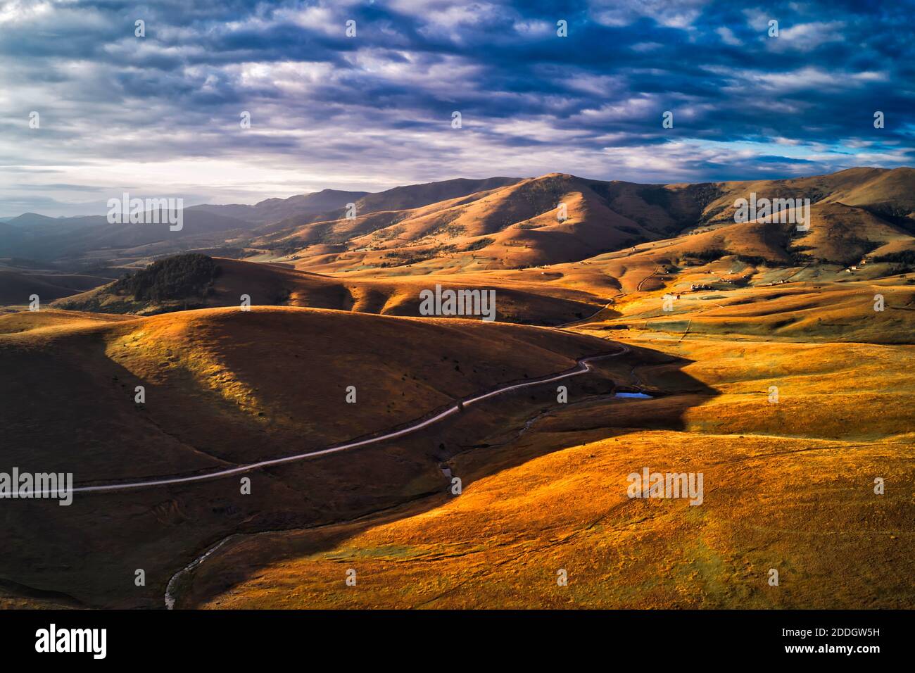 Aerial view of beautiful Zlatibor region landscape with asphalt road ...