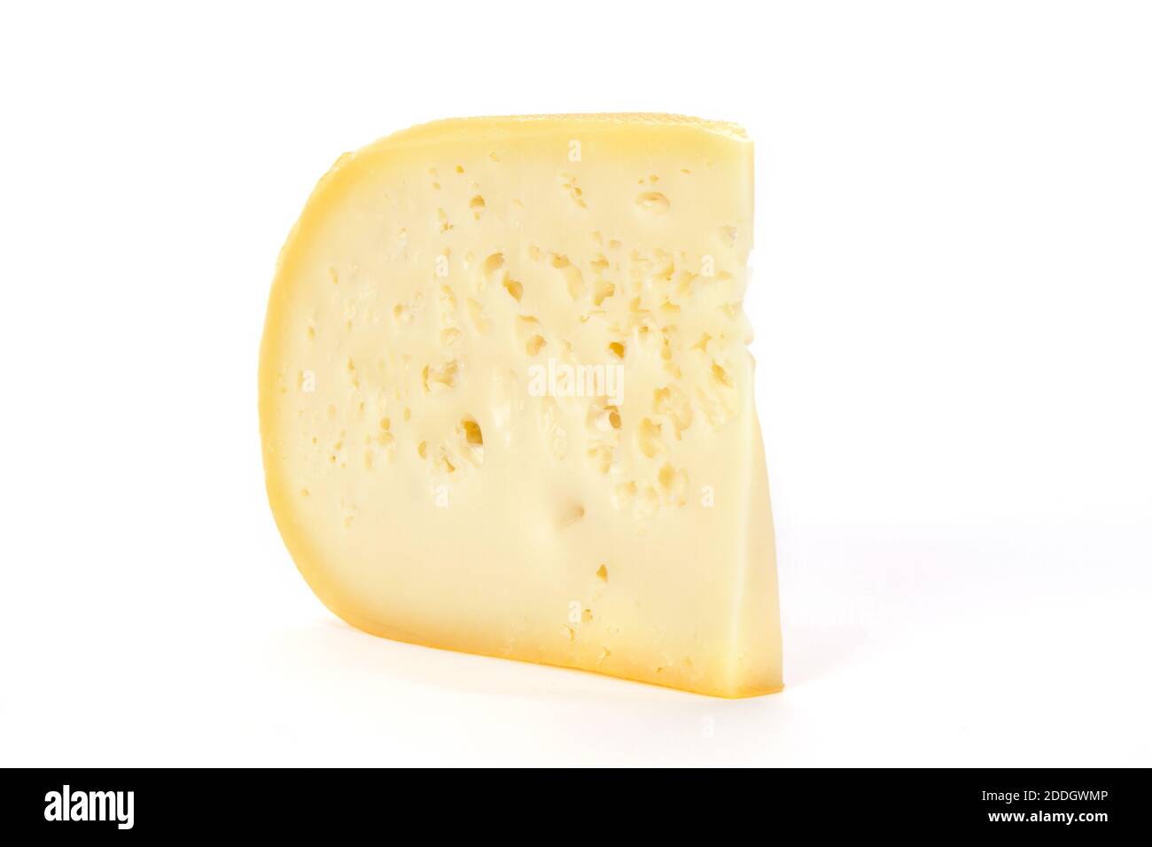 A block of yellow delicious cheese isolated on a white background Stock ...