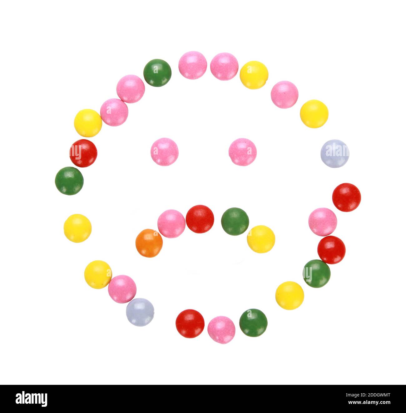 A sad face made of colorful candies on white background Stock Photo - Alamy