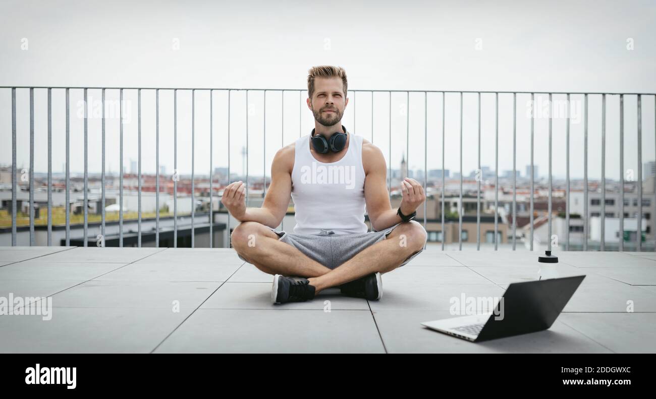Outdoor health and fitness workout on a rooftop terrace Stock Photo - Alamy