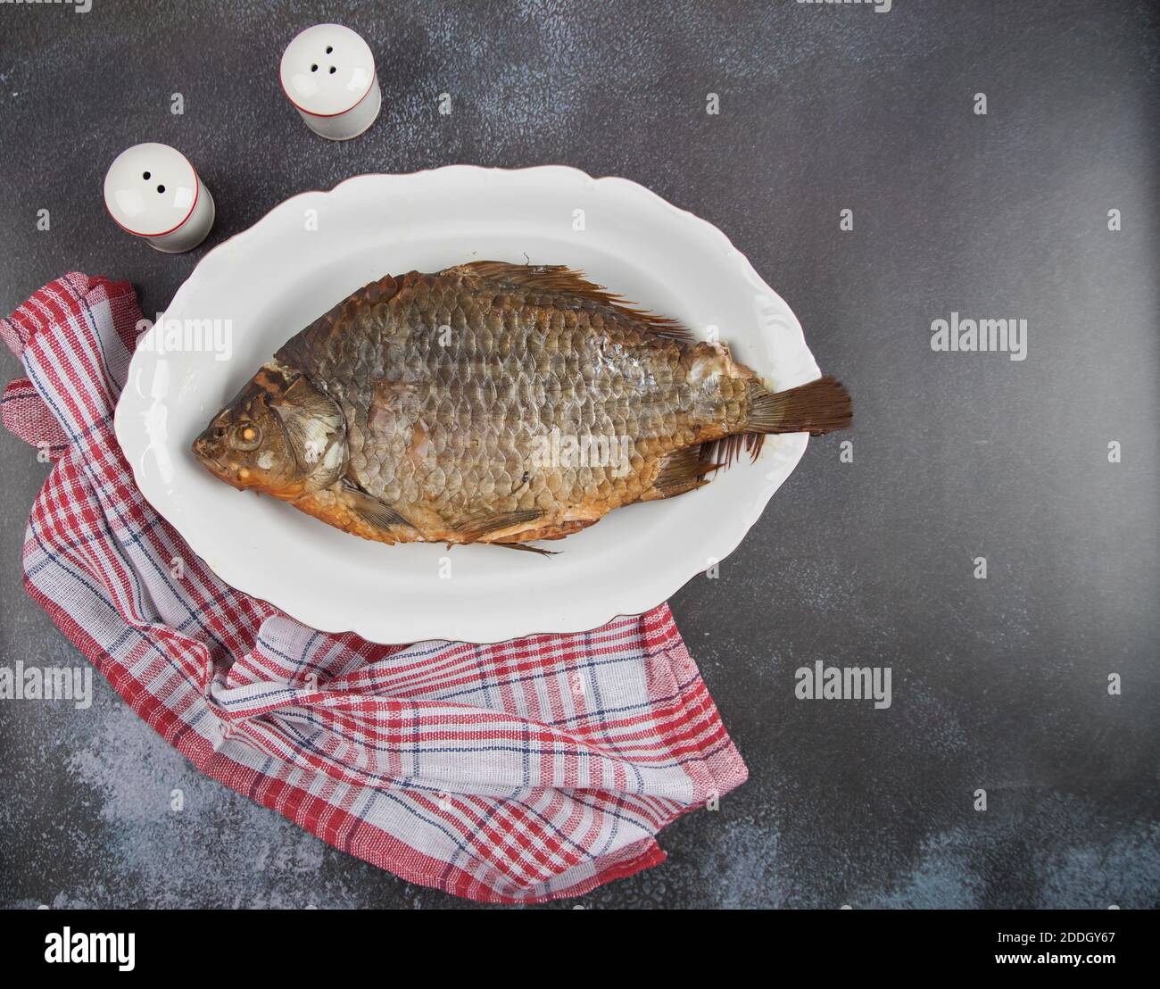 Whole fish cooked white background hi-res stock photography and images ...