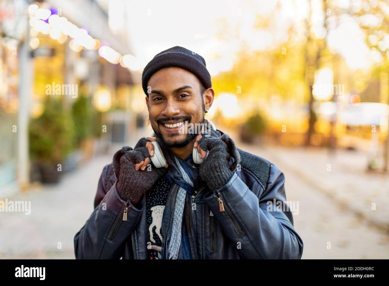 Portrait of a handsome young man on the city street Stock Photo - Alamy