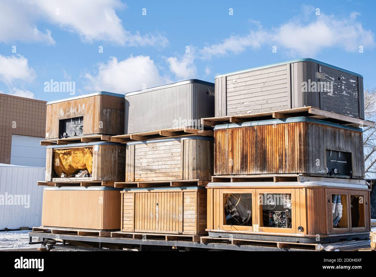 old discarded hot tubs ready for recycling Stock Photo - Alamy