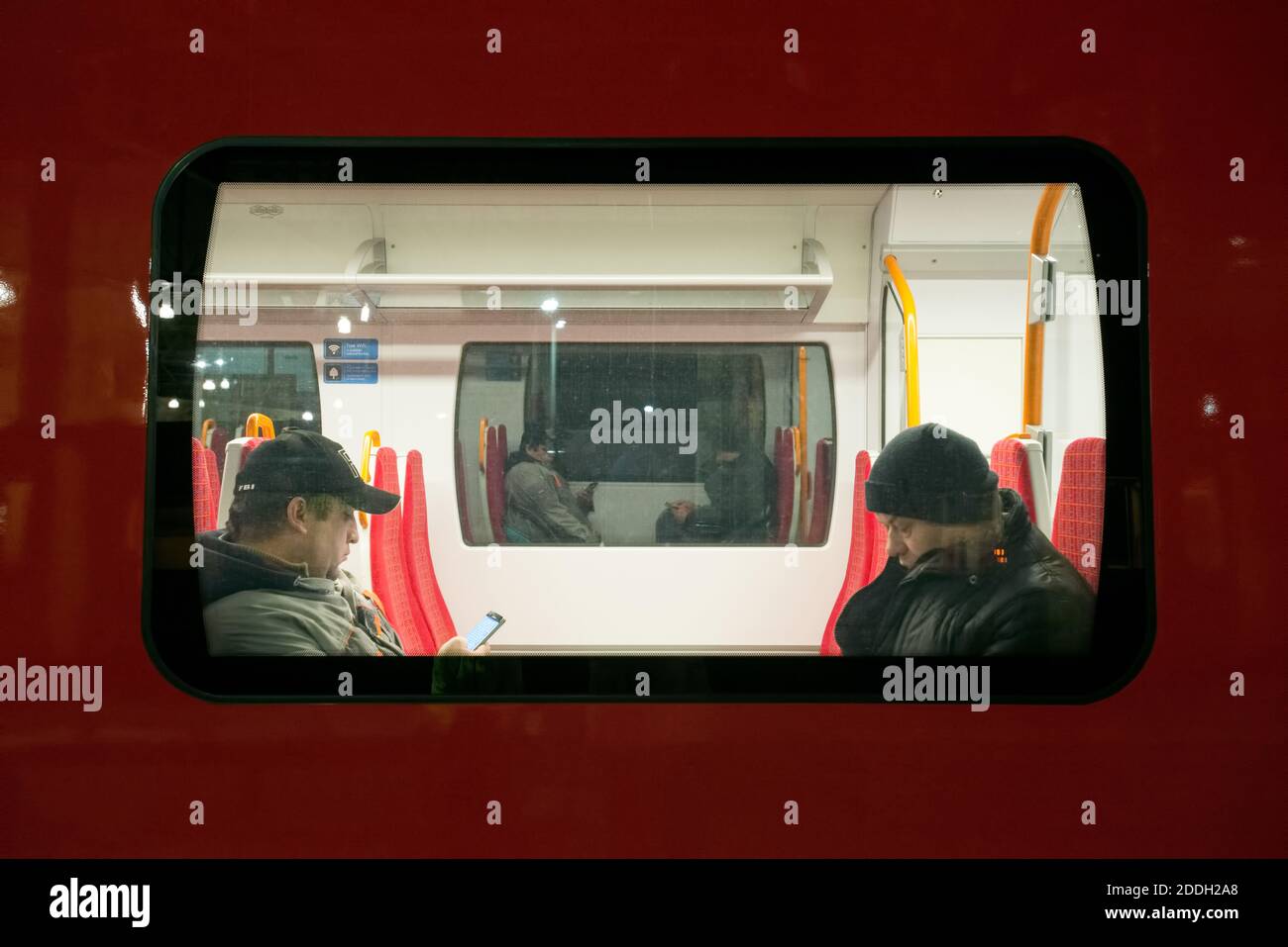 Early morning commuters in a Train Stock Photo - Alamy