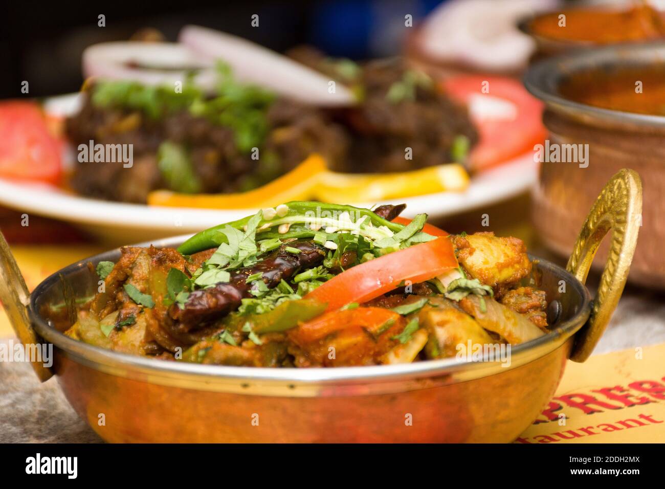 A closeup shot of Indian restaurant non-vegetarian thali with rice ...