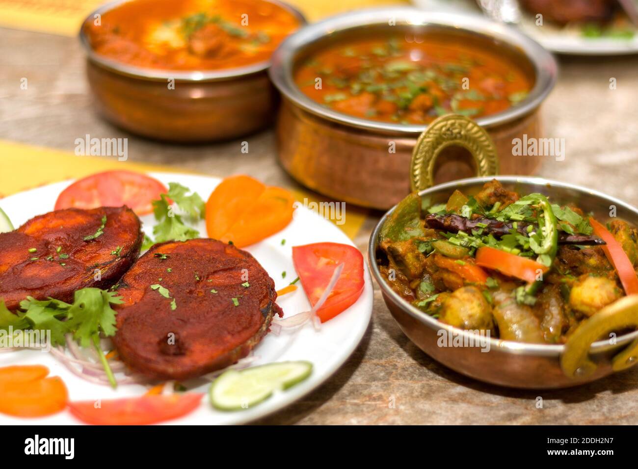 A closeup shot of Indian restaurant non-vegetarian thali with rice ...