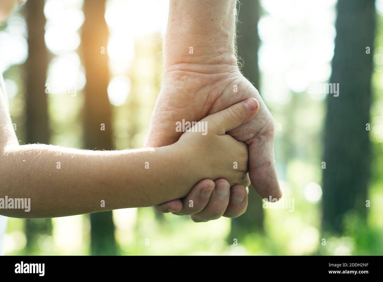 Father protecting son hi-res stock photography and images - Alamy
