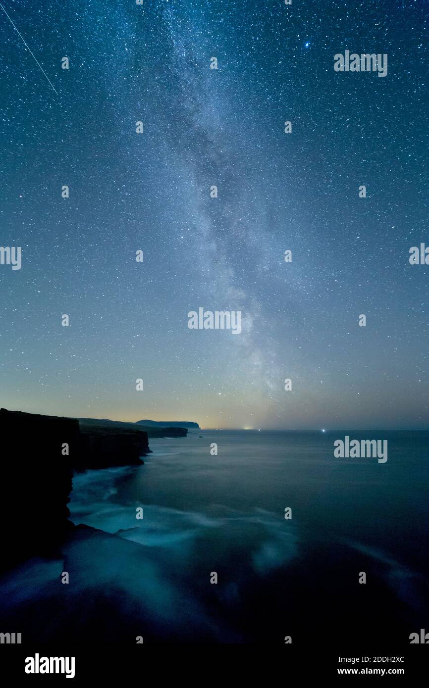 View of Milky Way galaxy from Yesnaby cliffs, Orkney Stock Photo - Alamy