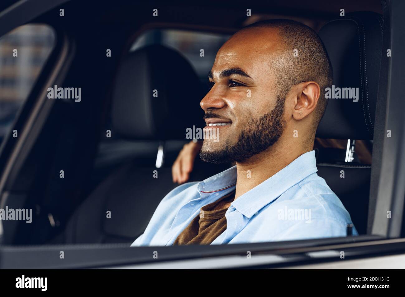 African american male driver sitting in a car Stock Photo - Alamy