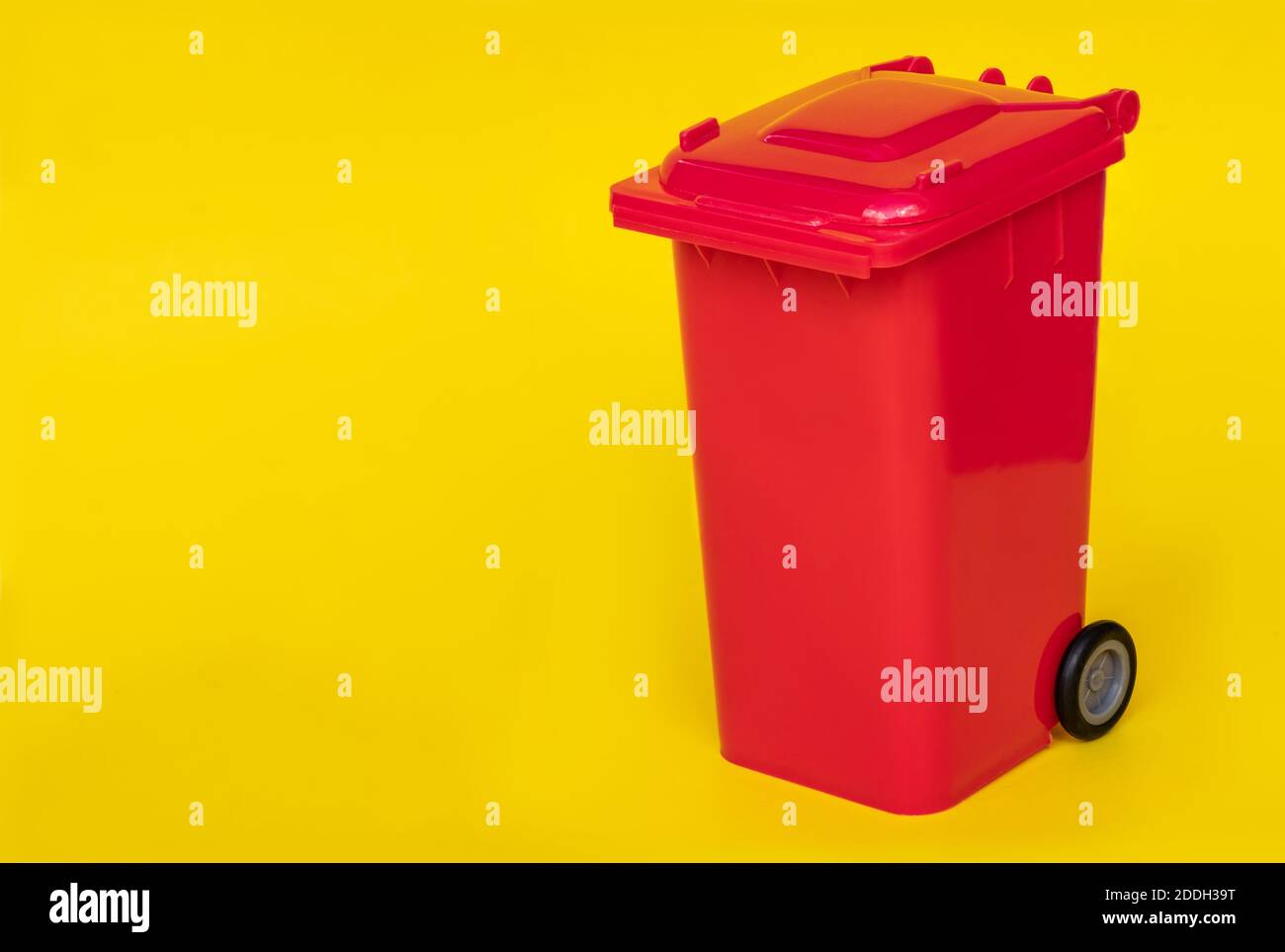 Red wheelie waste bin hi-res stock photography and images - Alamy