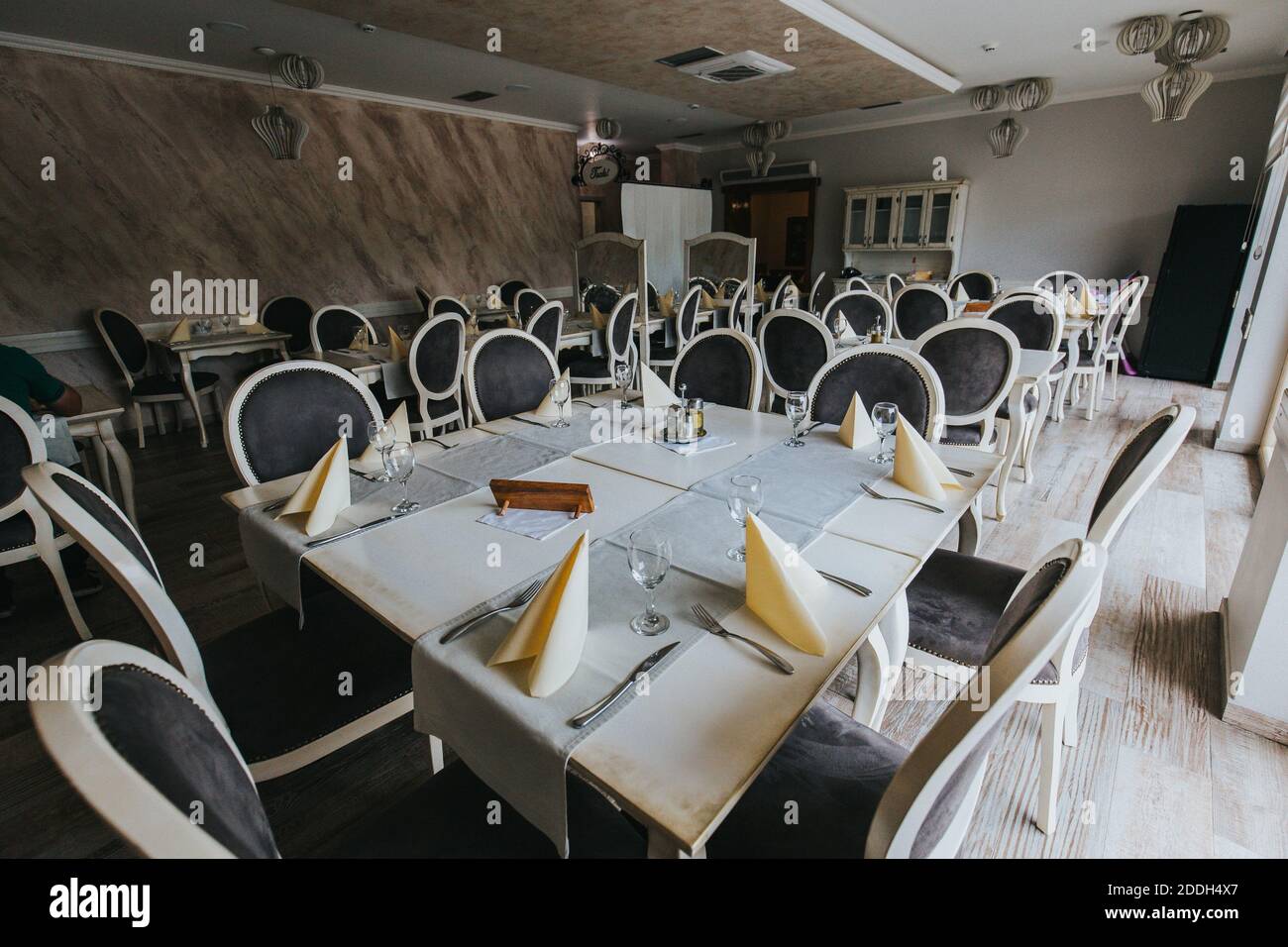 A view inside a modern table and chair set-up in a restaurant Stock ...