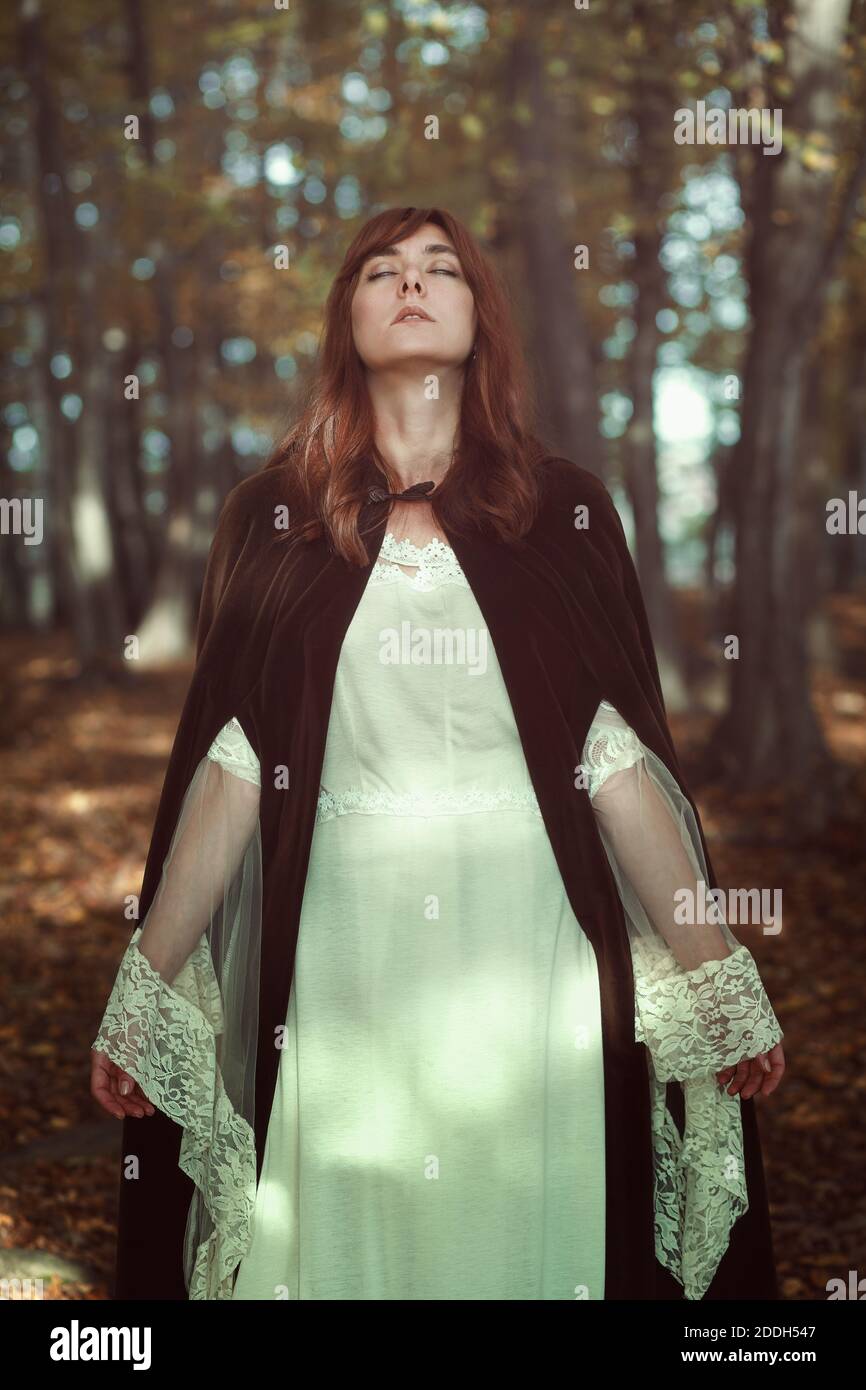 Woman celtic dress hood hi-res stock photography and images - Alamy