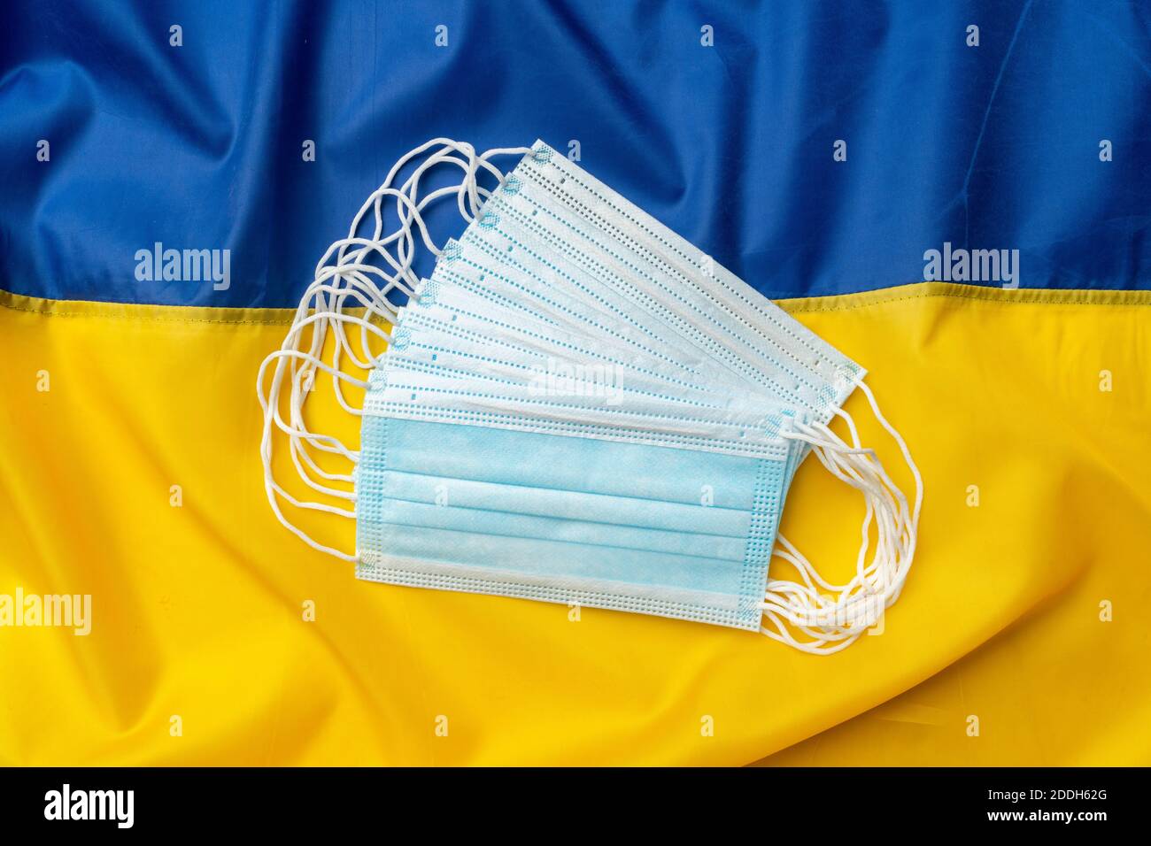 Medical face masks on flag of Ukraine Stock Photo - Alamy