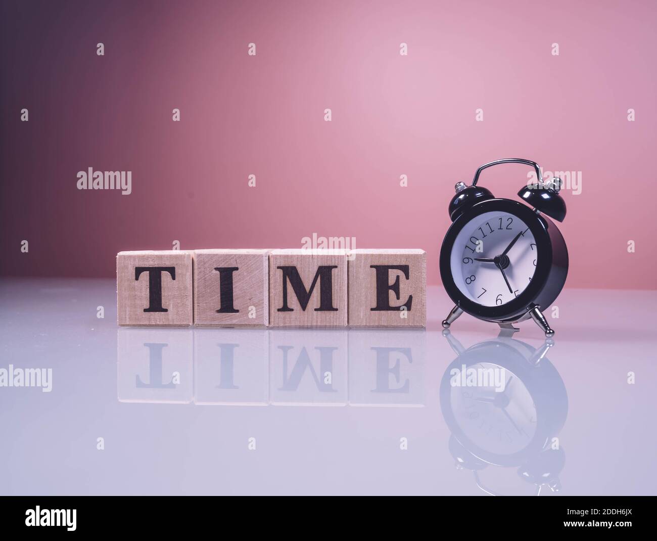 Text TIME on wood cube blocks, stock investment concept. The word TIME ...