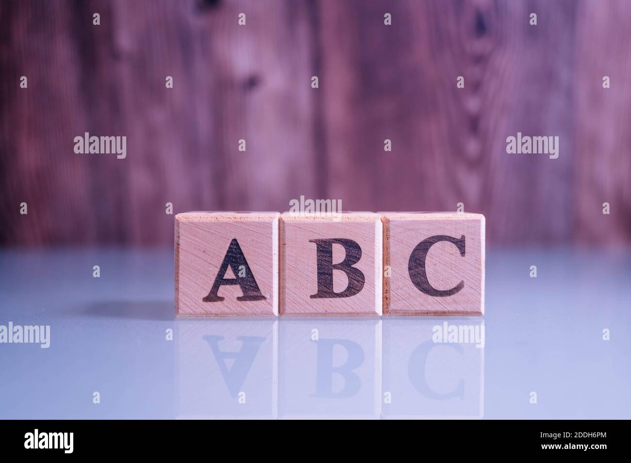 Text ABC on wood cube blocks. The letters ABC written on the cubes in ...
