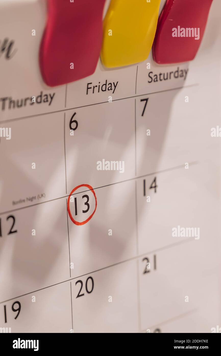 Calendar page with marked date of friday 13th Stock Photo - Alamy
