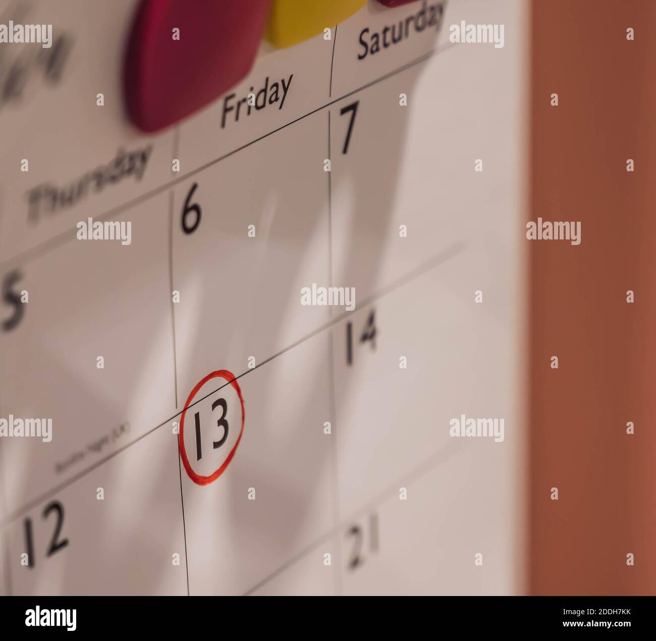 Calendar page with marked date of friday 13th Stock Photo - Alamy